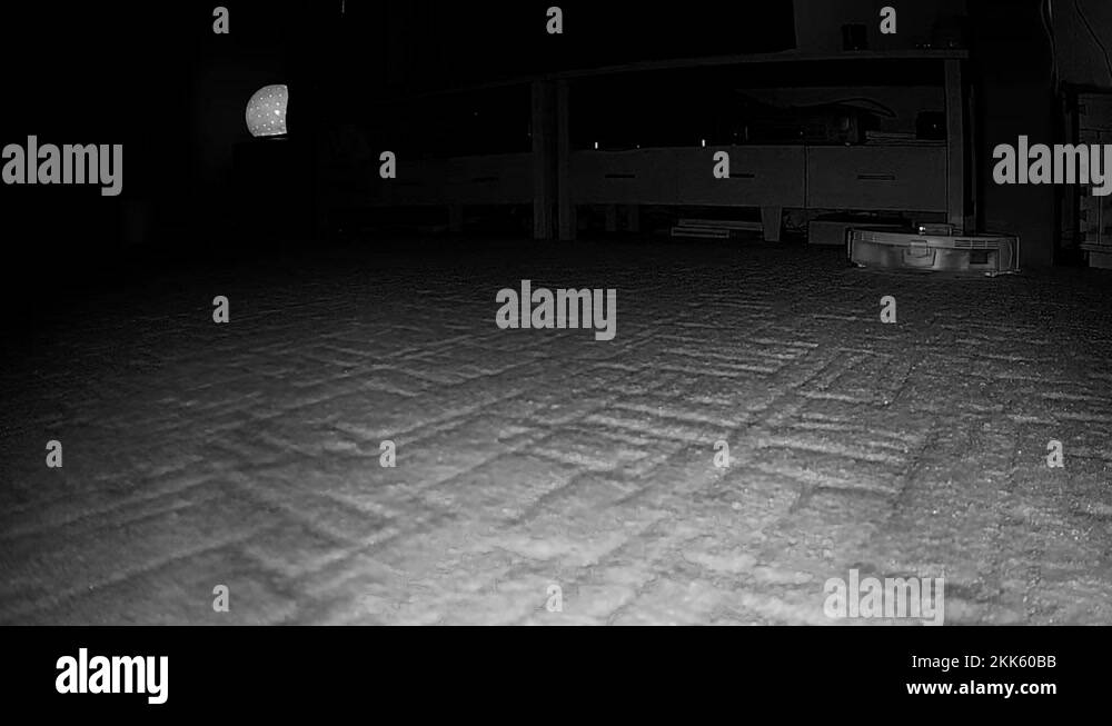 A closer look of the white round vacuum on the floor Stock Video ...