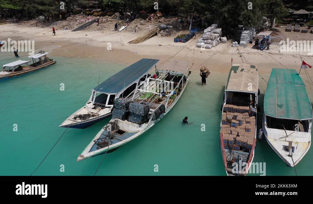 Trash For Recycling Loaded Onto Boat By Local Garbage Workers In Gili ...