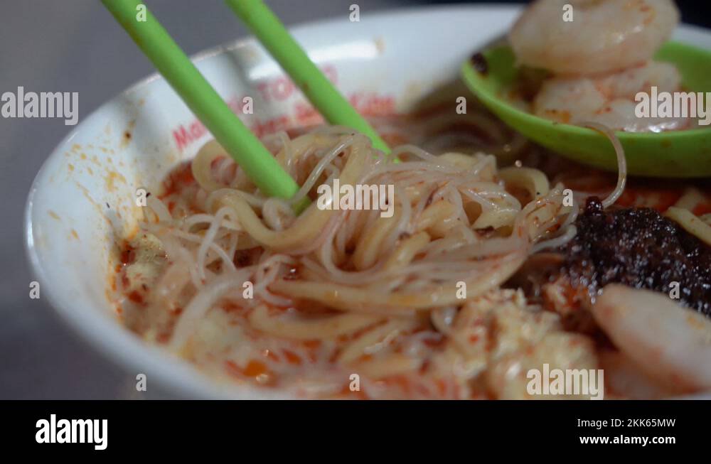 Penang prawn mee soup Stock Videos & Footage - HD and 4K Video Clips ...