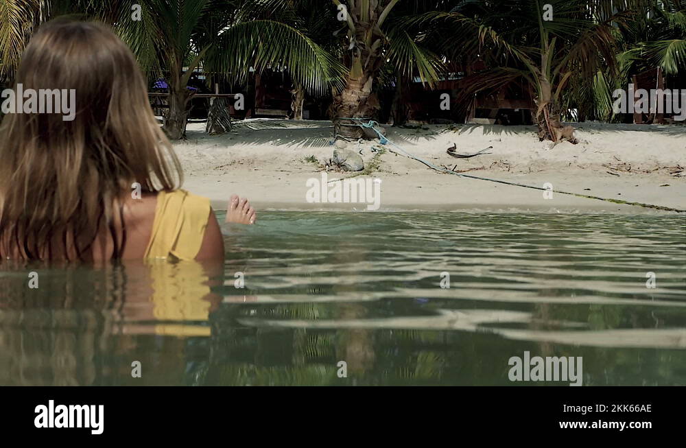 Girl swims in the sea, girl on vacation at sea, swim in the water Stock ...