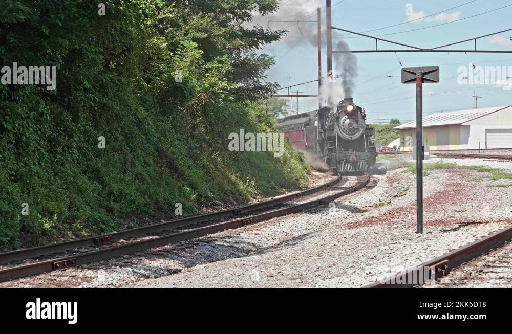 Antique Steam Locomotive and Passenger Cars Starting Up with Steam and ...