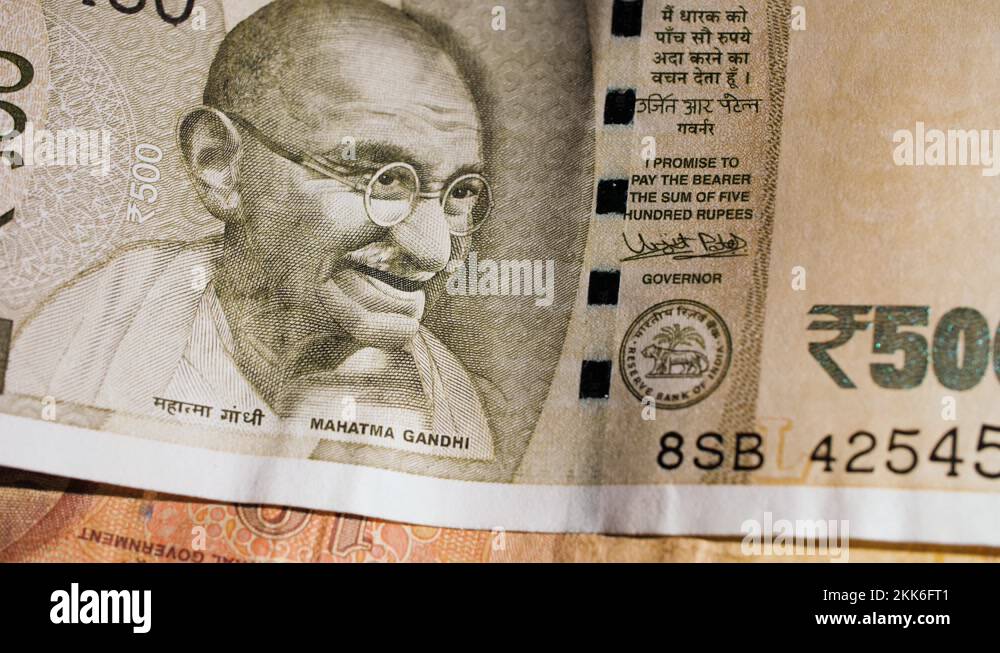Rotating close up of an Indian 500 Rupee bill with face of Mahatma ...