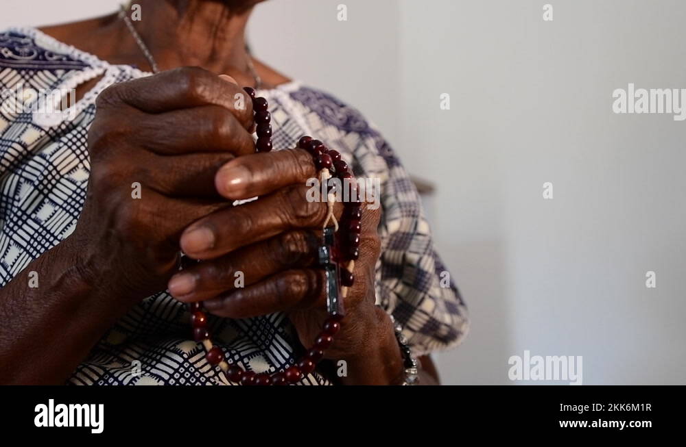 Praying with rosary Stock Videos & Footage - HD and 4K Video Clips - Alamy