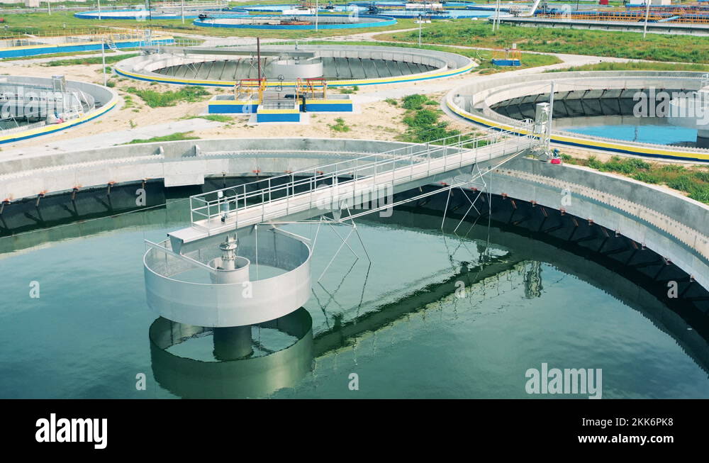 Circular clarifiers located at a massive sewage water cleaning facility ...