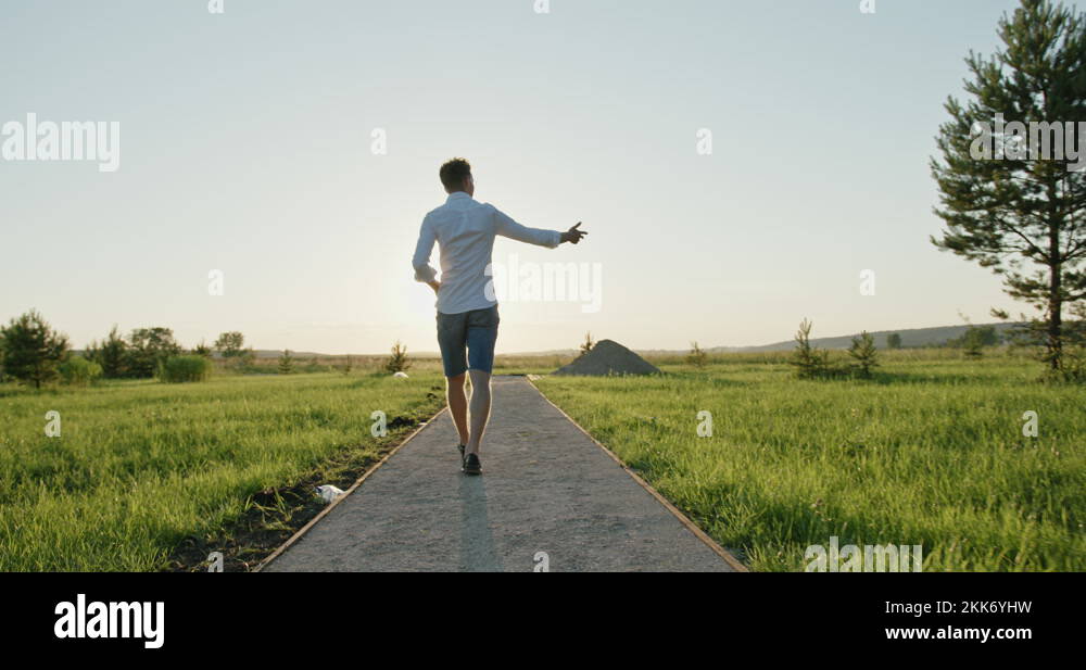 Man walking away down a pathway Stock Videos & Footage - HD and 4K ...