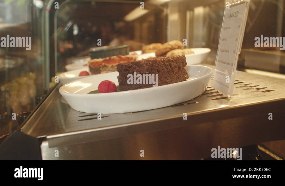 Cakes Inside Glass Showcase Cabinet In The Bakery Shop In Ubud, Bali ...