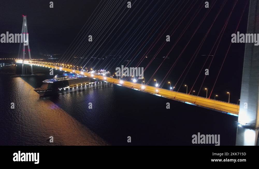 Drone flight night Russian bridge Vladivostok Epic cruise ship liner ...