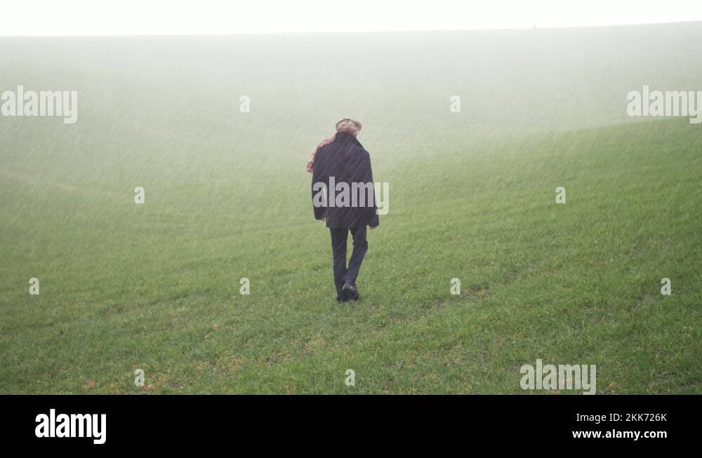 Gray rain coat Stock Videos & Footage - HD and 4K Video Clips - Alamy