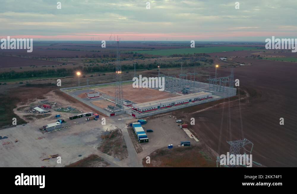 Construction site of a modern power station with a huge metal tower, 4k ...