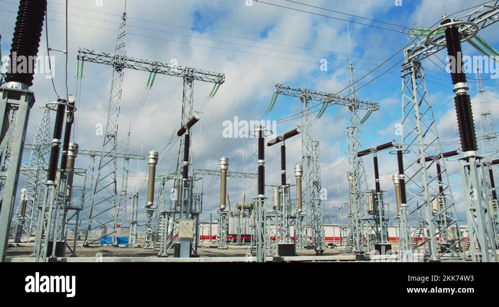 Massive metal structures at the power plant, power lines and ...