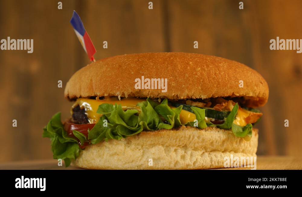 Delicious burger with small Filipino flag on top of them with ...