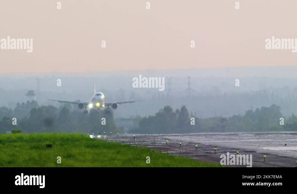 Airplane landing on the runway. A320 on final approach for landing.4K ...