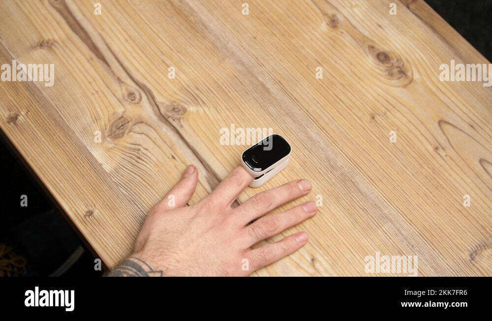 Oximeter is put on the index finger. Measuring Oxygen Saturation in ...