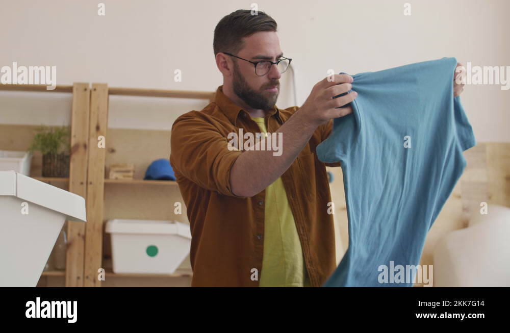 Man sorting wardrobe Stock Videos & Footage - HD and 4K Video Clips - Alamy