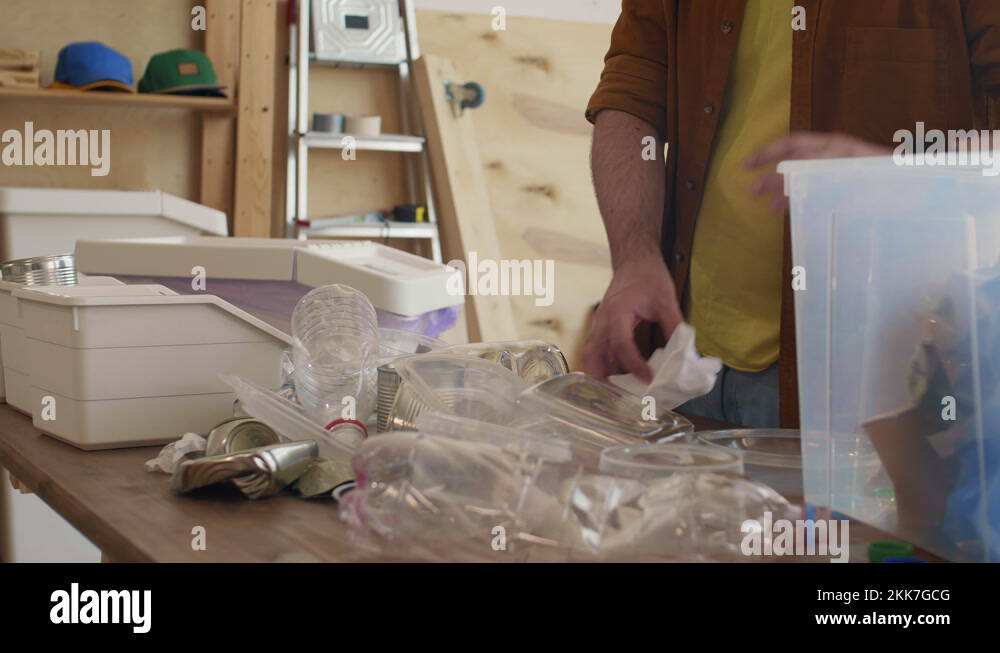 Unrecognizable Man Sorting Different Garbage in Sorting Center Stock ...