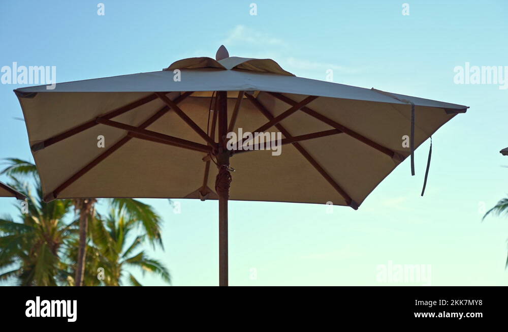 Open parasol beach Stock Videos & Footage - HD and 4K Video Clips - Alamy