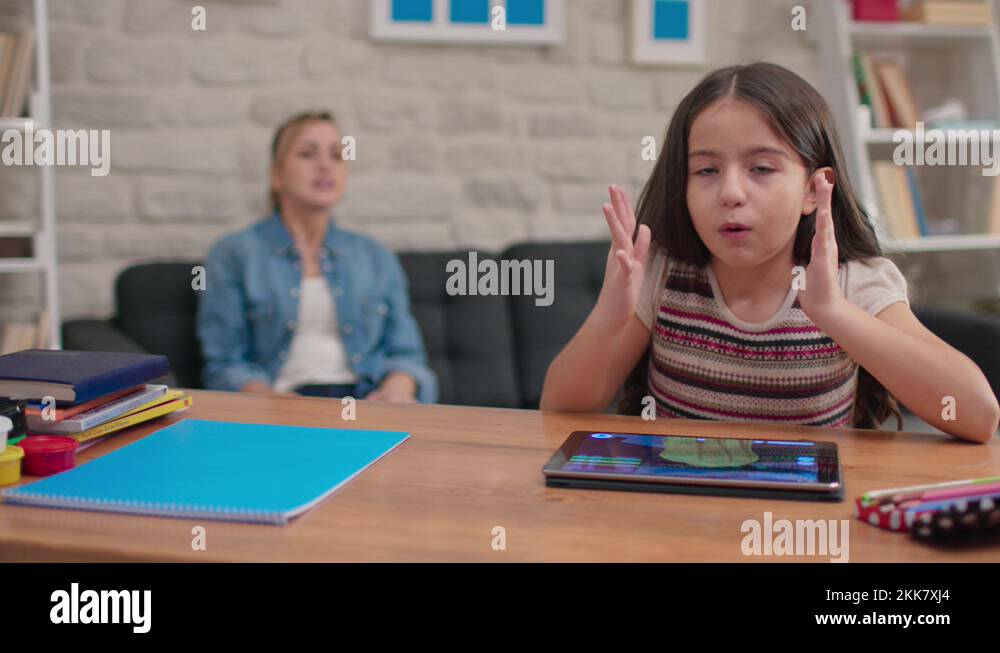 Mother constantly shouting at her daughter who plays games on the ...