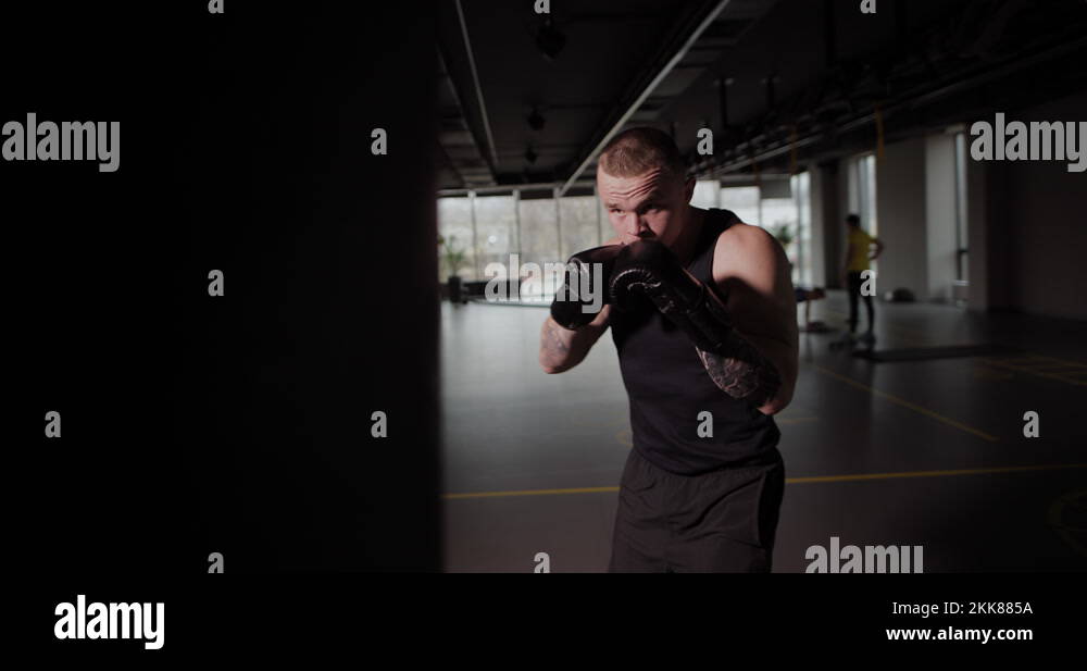 Boxer hitting a punching bag, slow motion at 120 fps in 4k Stock Video ...