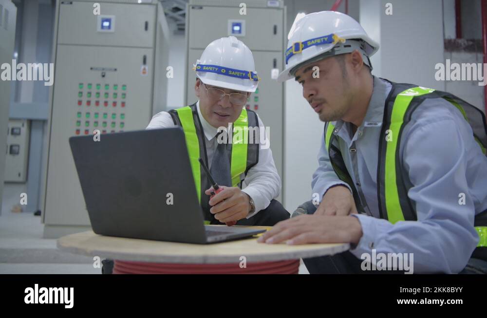Engineer concept of 4k Resolution. The employee is checking the ...