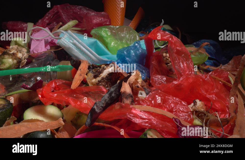 A pile of garbage in a landfill. Organic waste, food loss, plastic ...