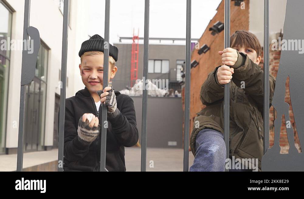 Two poor street boys need help asking help food donation from strangers ...