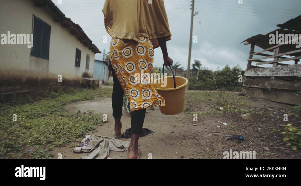 Carrying water africa Stock Videos & Footage - HD and 4K Video Clips ...