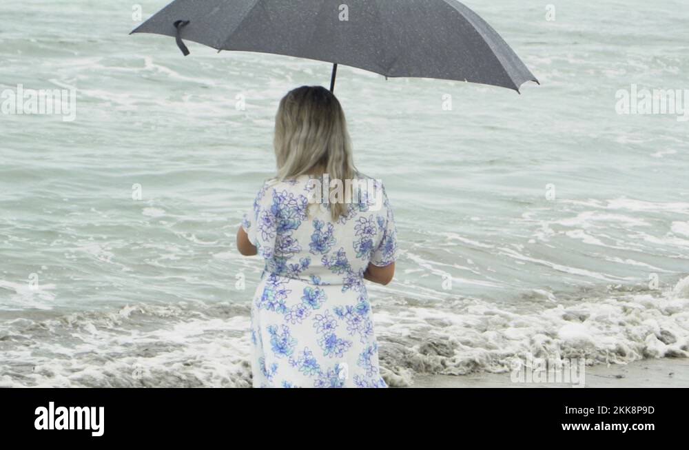 Woman umbrella raining walking Stock Videos & Footage - HD and 4K Video ...