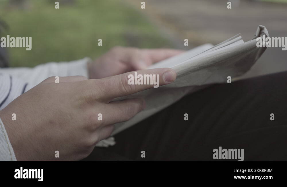 Unrecognizable young Caucasian man closing book and leaving. Male ...