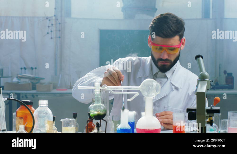 Scientist man in the biotechnology laboratory doing test using some ...