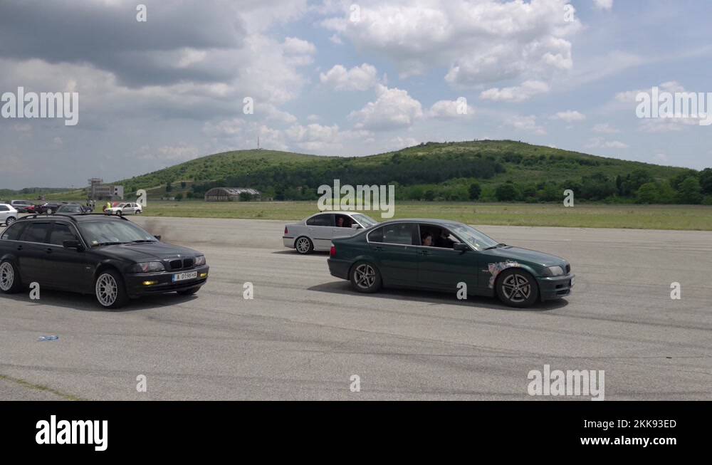 Cars Accelerating On The Road Track During Drag Racing Competition In ...
