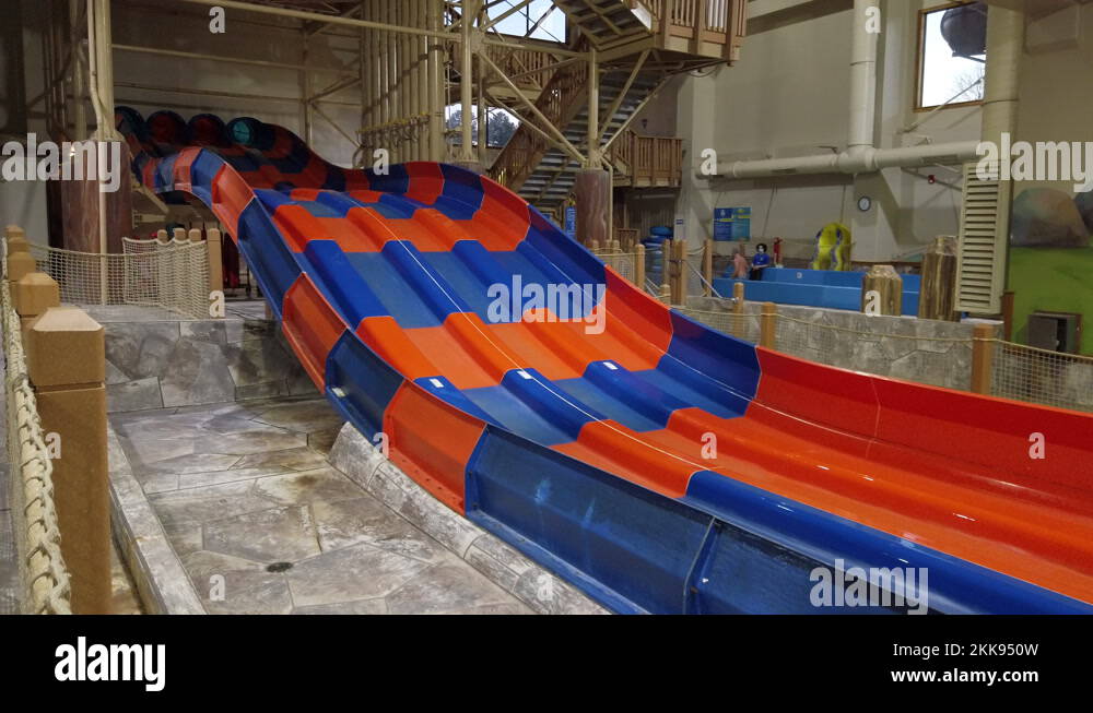 Water slides at an indoor water park Stock Video Footage - Alamy