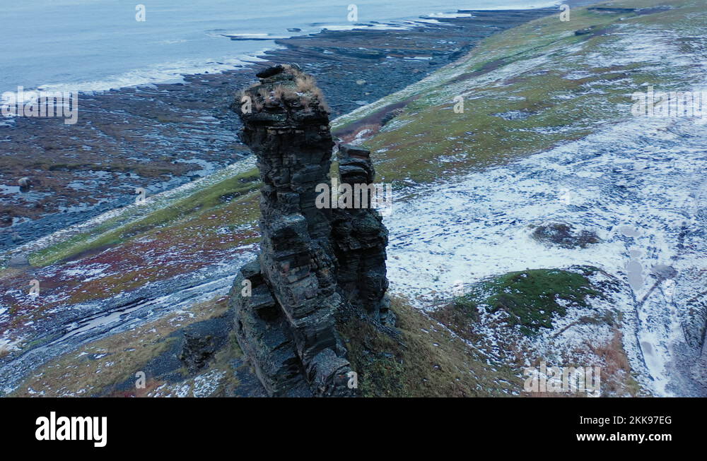 Ancient geological formation weathered rock on the Rybachy Peninsula ...