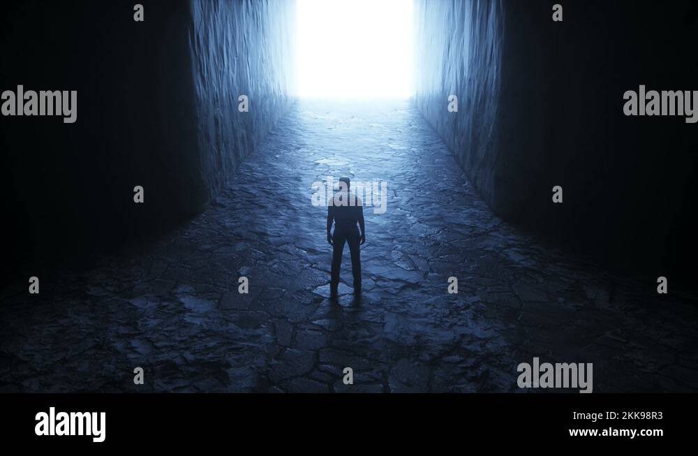 a lonely man stands in front of a light portal. Realistic 4k animation ...