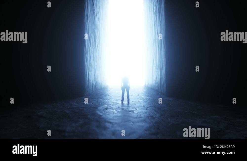 a lonely man stands in front of a light portal. Realistic 4k animation ...