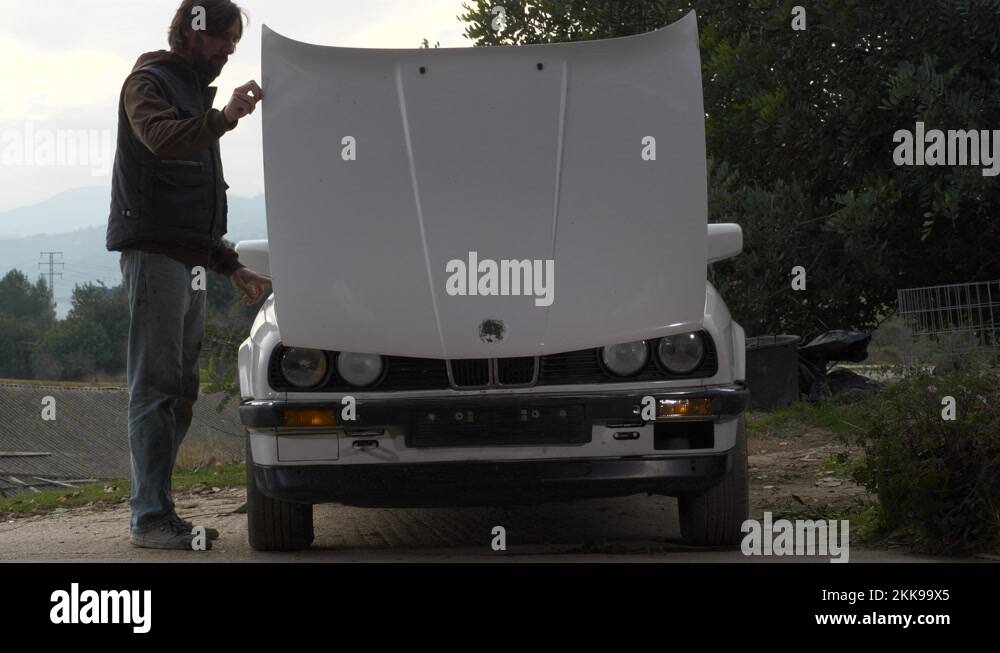 Mechanic bonnet Stock Videos & Footage - HD and 4K Video Clips - Alamy