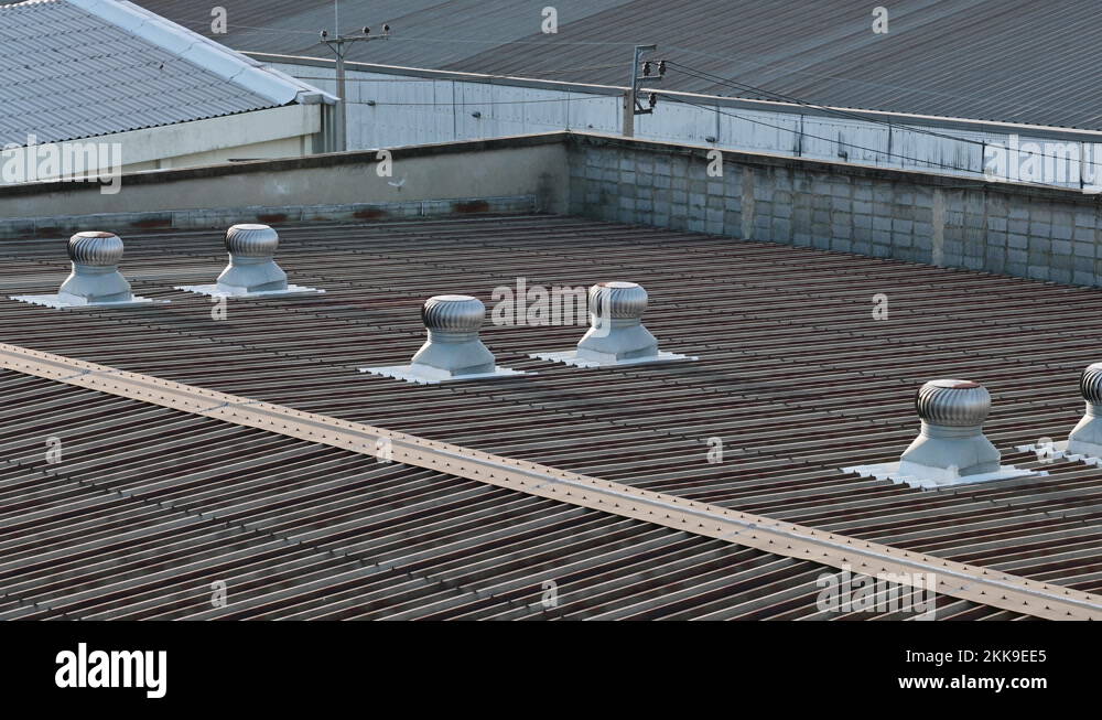 4K Roof wind turbine on a metal roof for air circulation Stock Video ...