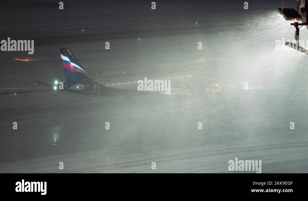 An aerodrome tractor tows Aeroflot Airbus A320 passenger plane to the ...