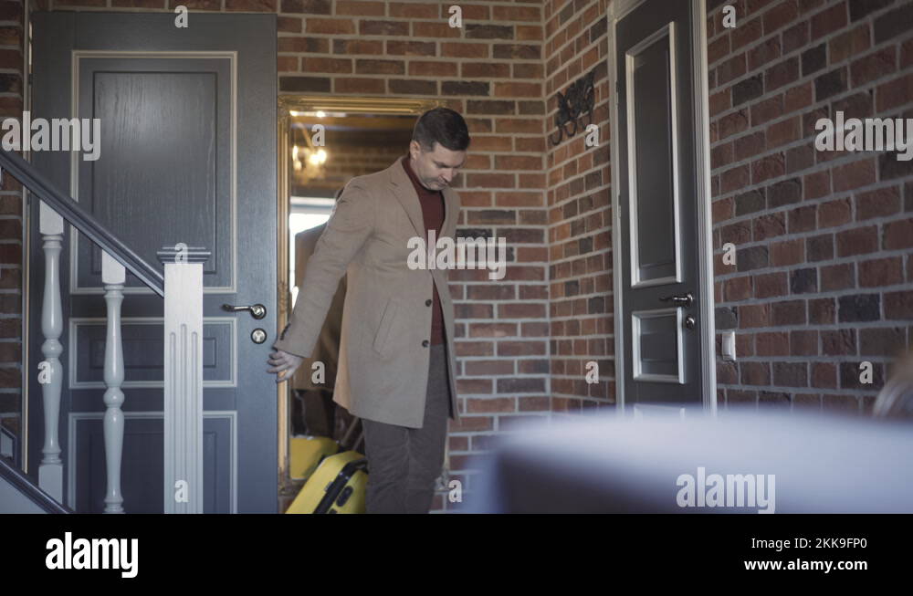 Man entering house Stock Videos & Footage - HD and 4K Video Clips - Alamy