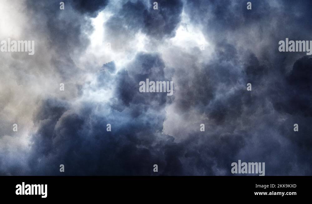 a thunderstorm inside a thick, dark cloud Stock Video Footage - Alamy