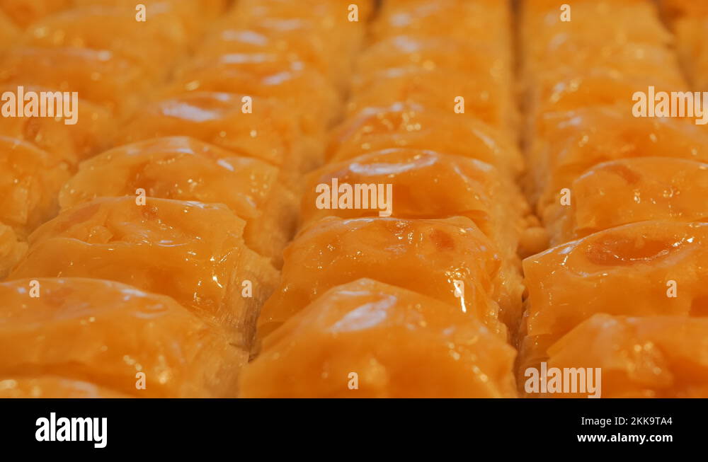 Fresh Turkish baklava golden color. Dolly shooting baklava which is in ...