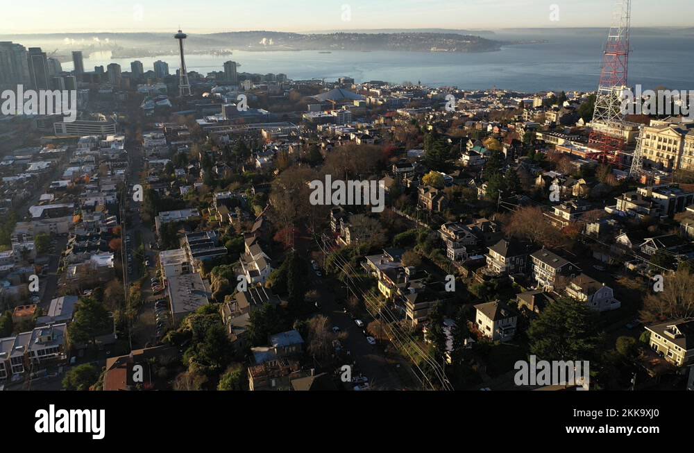 Cinematic reverse reveal sunrise drone footage of East Queen Anne ...