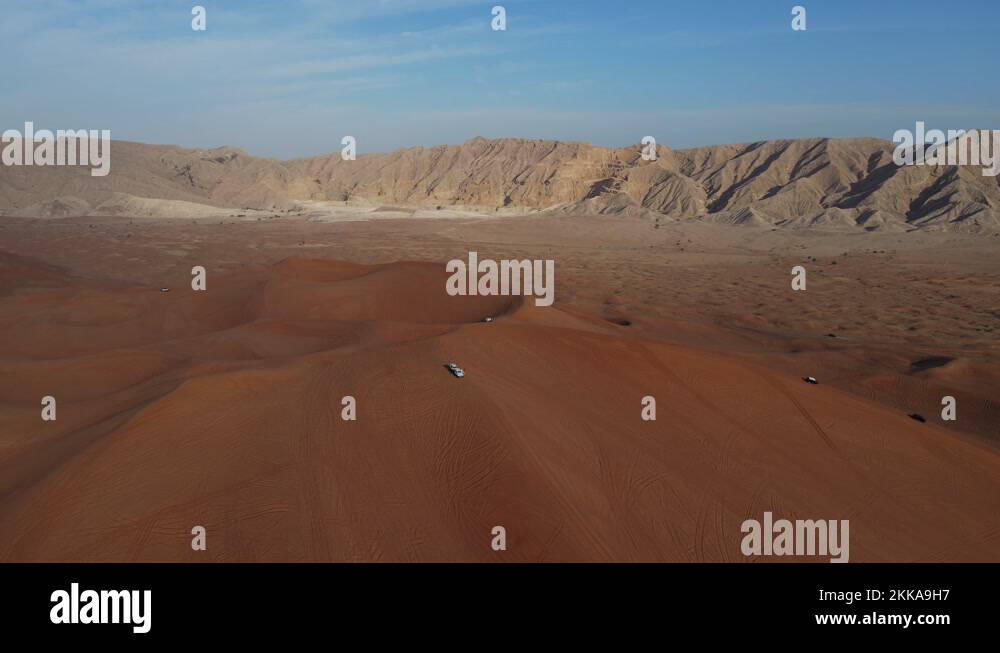 UAE Desert: Top View of Sharjah Desert, A group of 4x4 vehicles, rides ...
