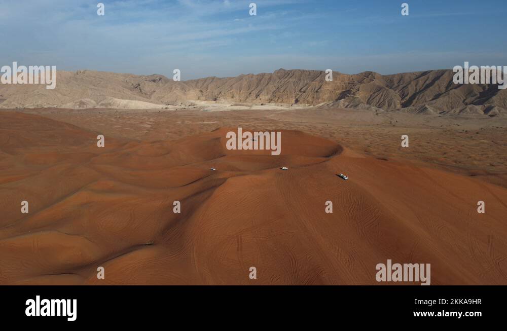 UAE Desert: Top View of Sharjah Desert, A group of 4x4 vehicles, rides ...
