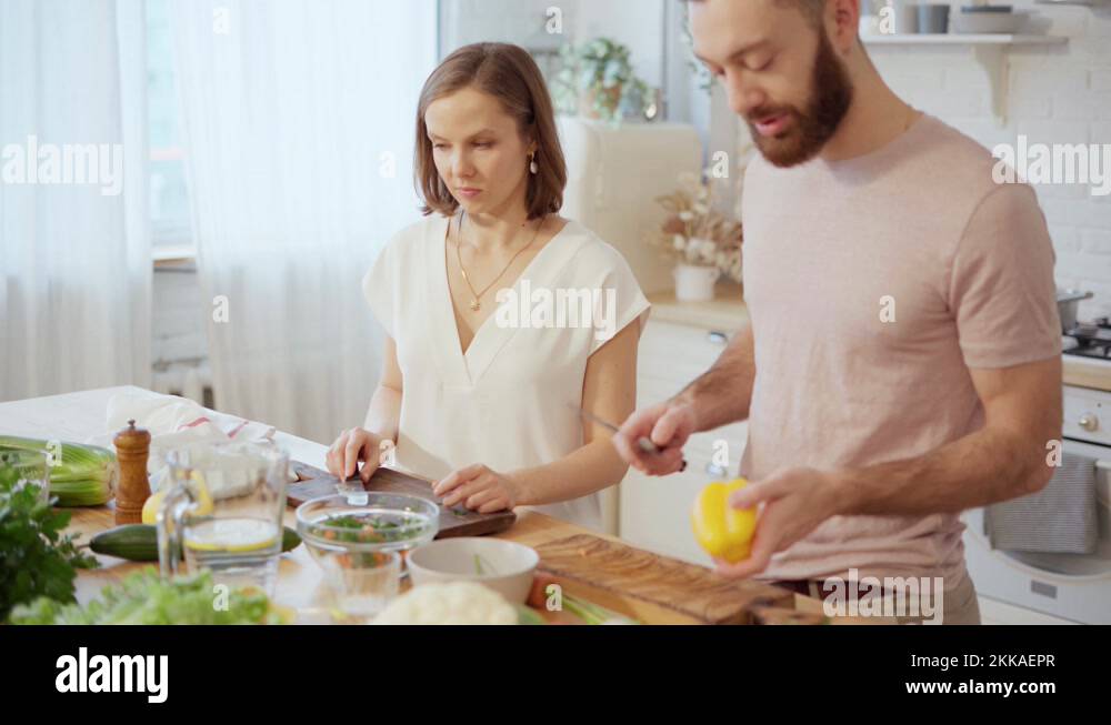 Young couple cooking together talking Stock Videos & Footage - HD and ...