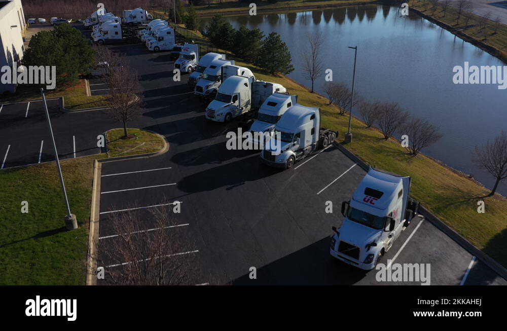 powerful truck tractors fleet in parking area of famous cargo and ...