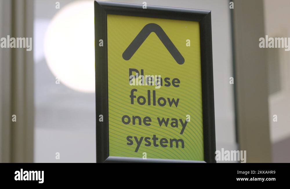 Queue this way sign Stock Videos & Footage - HD and 4K Video Clips - Alamy