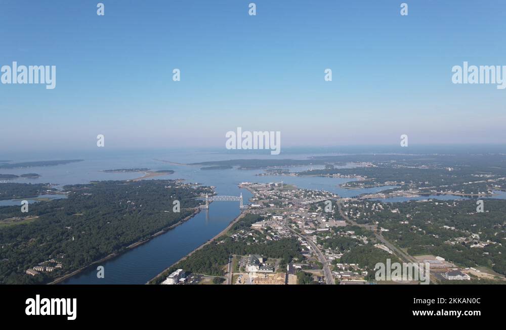 Aerial view of stunning Cape Cod Canal and Bay while panning from right ...