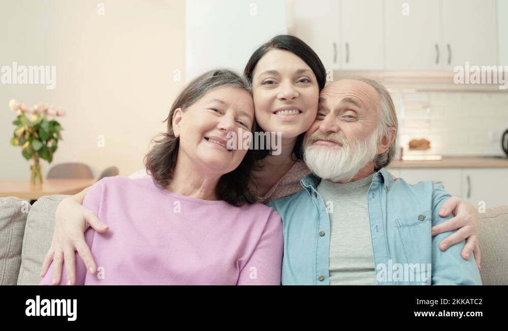 Daughter hugging her parents Stock Videos & Footage - HD and 4K Video ...