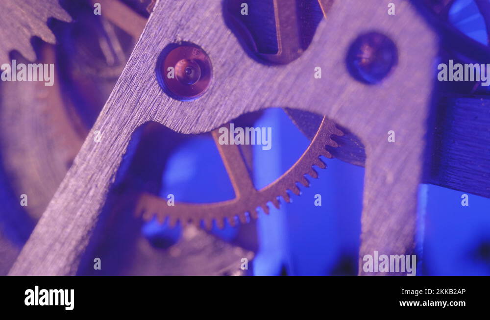 Cogwheel And Gears Working In Mechanism Of Watch In Blue Background ...