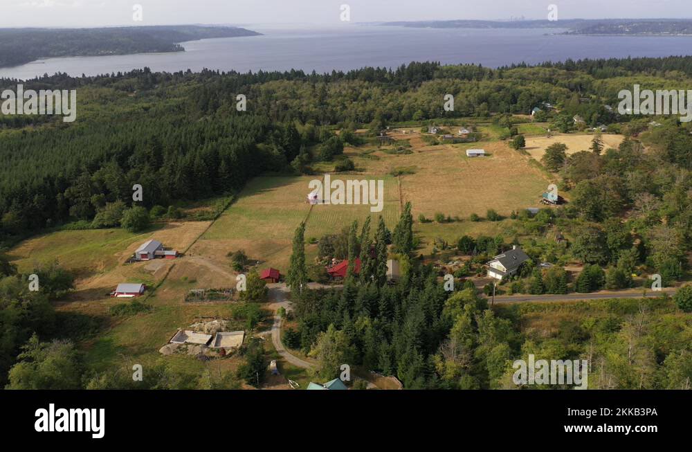 Aerial drone flyover footage of Maury Island with views of Vashon ...